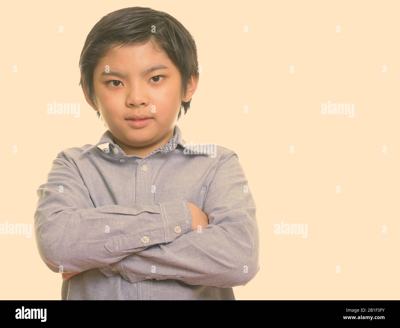 Boy isolated arms crossed hi-res stock photography and images - Alamy