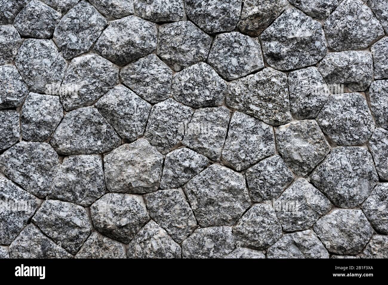 Natural stone masonry wall texture or background Stock Photo - Alamy