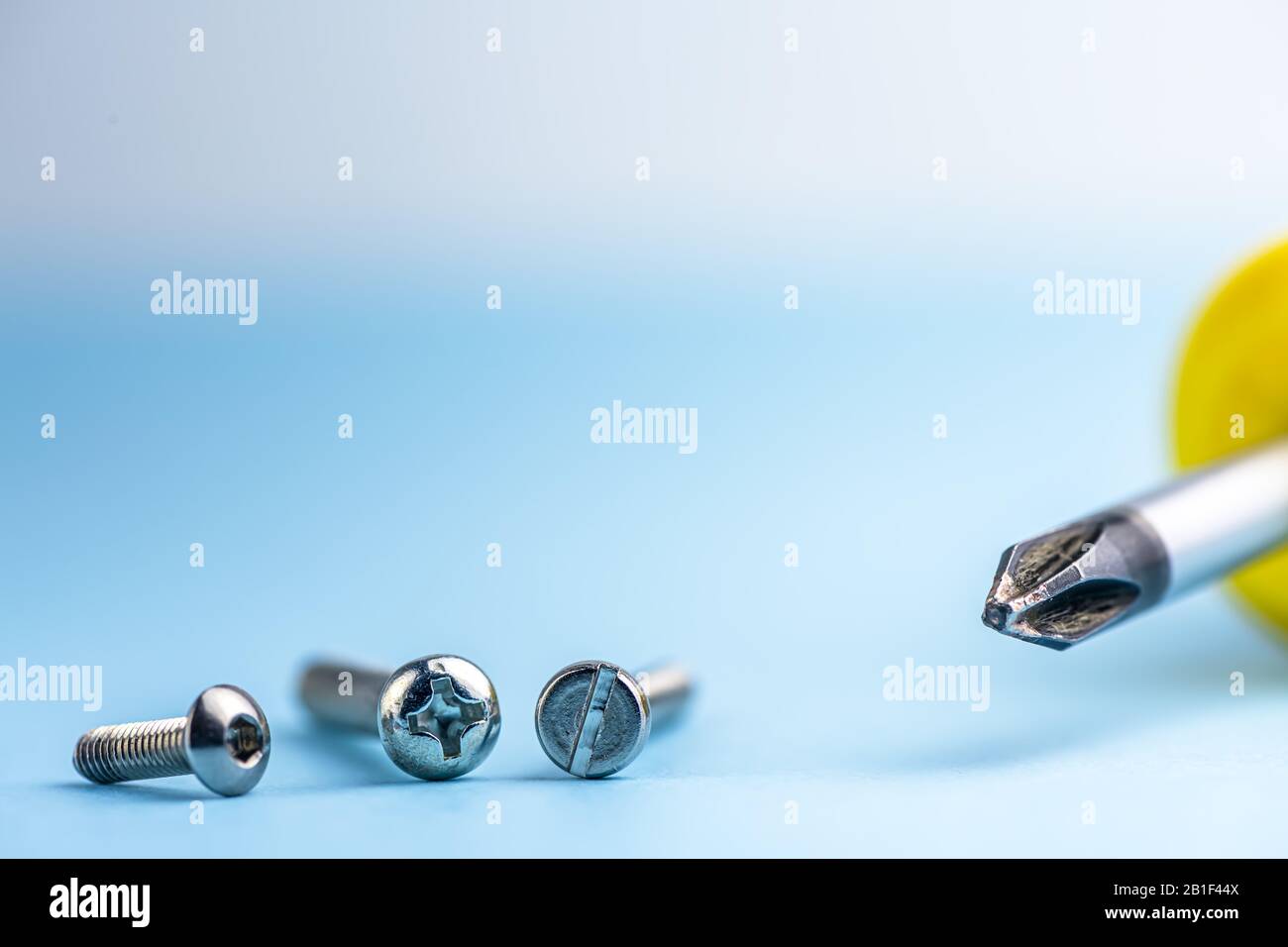 close up of screwdriver are cross and different screws. Tools ...