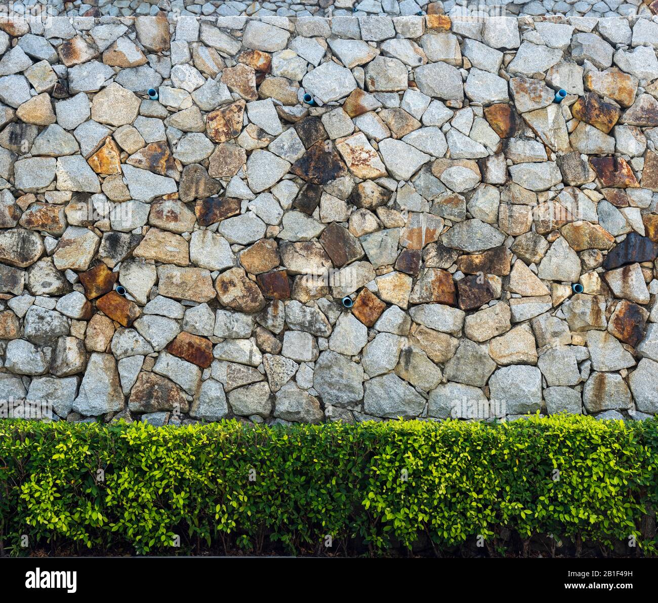 Natural stone masonry wall texture or background Stock Photo - Alamy