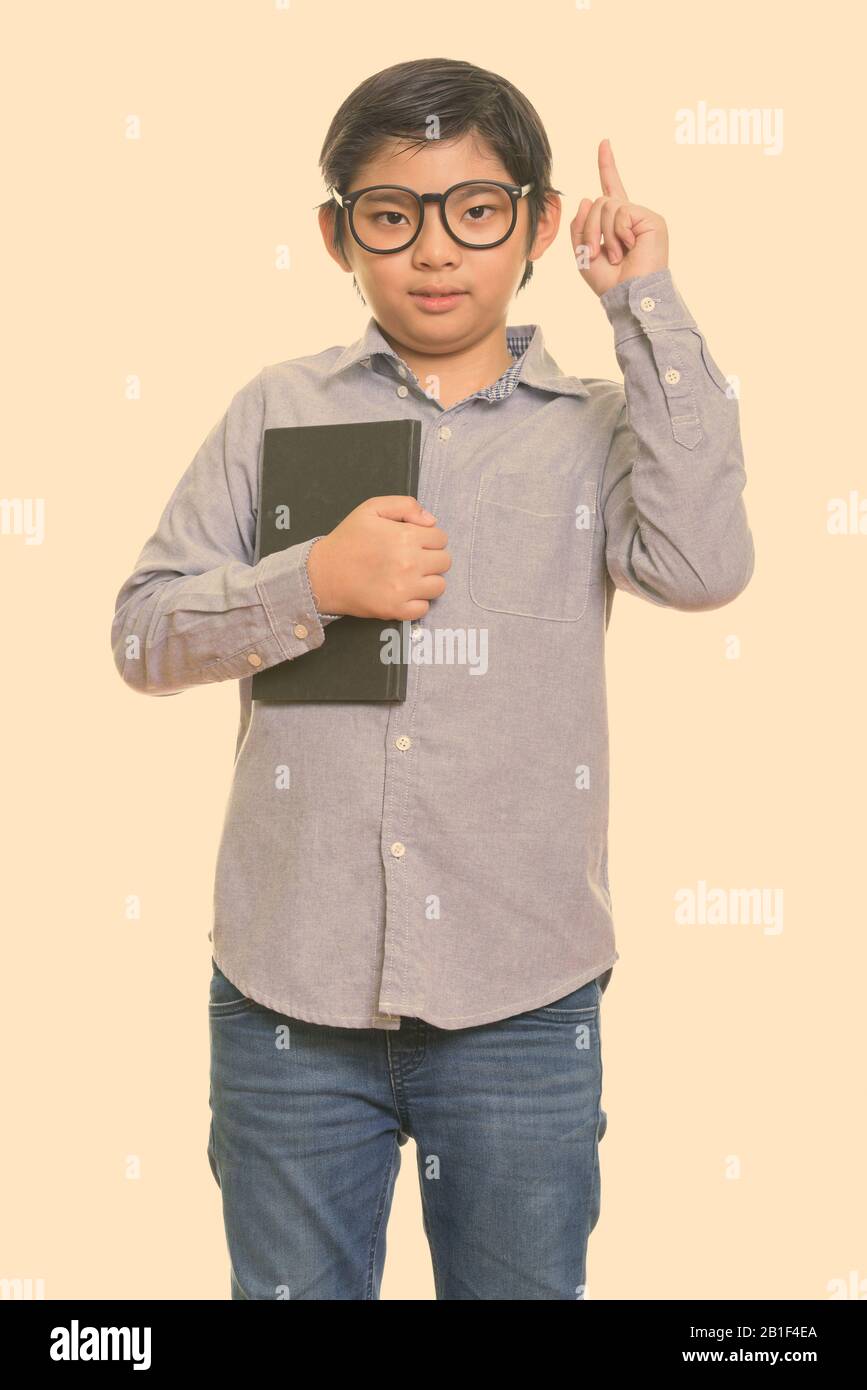 Pointing book child hi-res stock photography and images - Alamy