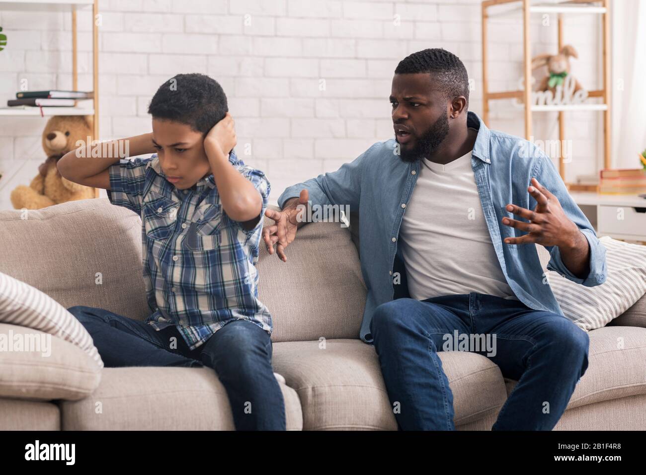 Fathers and son angry black hi-res stock photography and images - Alamy