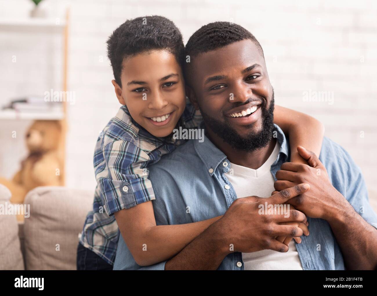 Closeup Portrait Of Happy Black Father And Son Posing At Home Stock ...