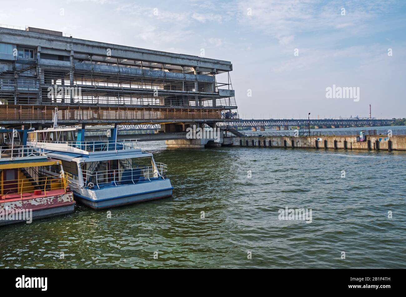 Dilapidated building river station of Soviet period on background of ...