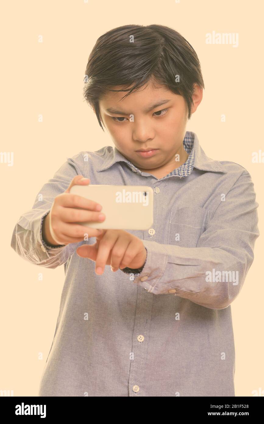 Boy photographing with mobile hi-res stock photography and images - Alamy
