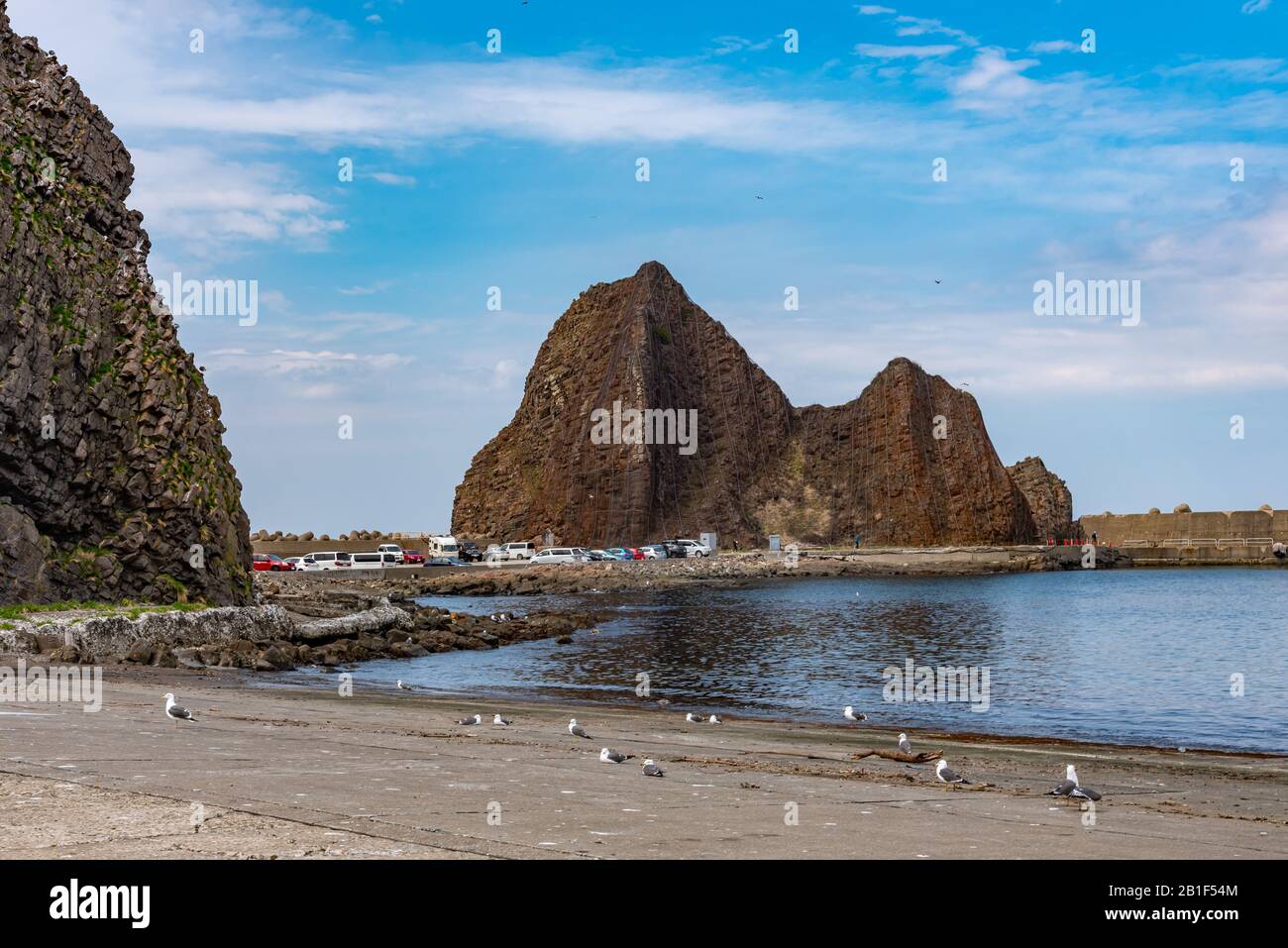 Oronko rock and Sankaku rock at Utoro fishing port, Utoronishi. Town ...