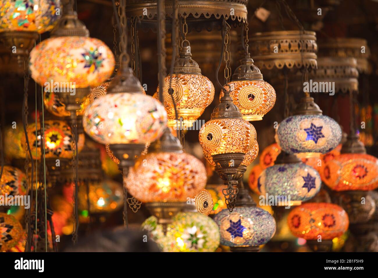 Hanging light decorations for sale at market Stock Photo - Alamy