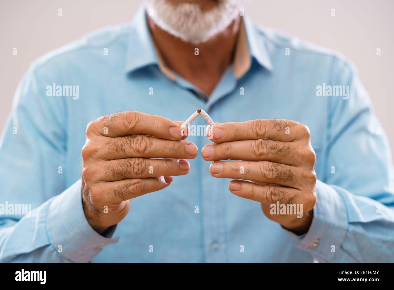 Serious senior man is decided to quit smoking Stock Photo - Alamy