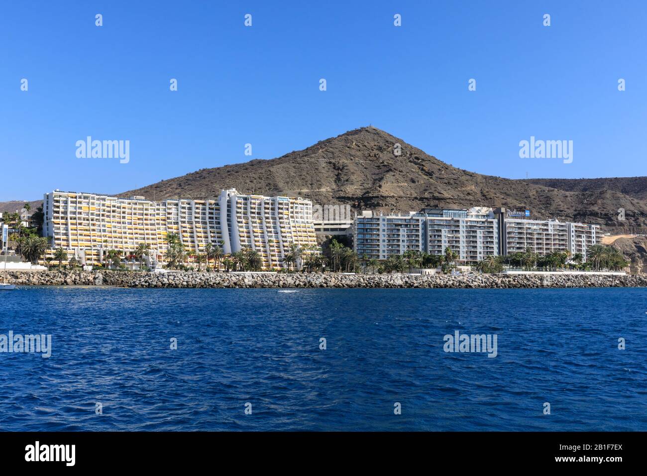 Hotel Radisson Blue and apartment buildings in Anfi del Mar seen from ...