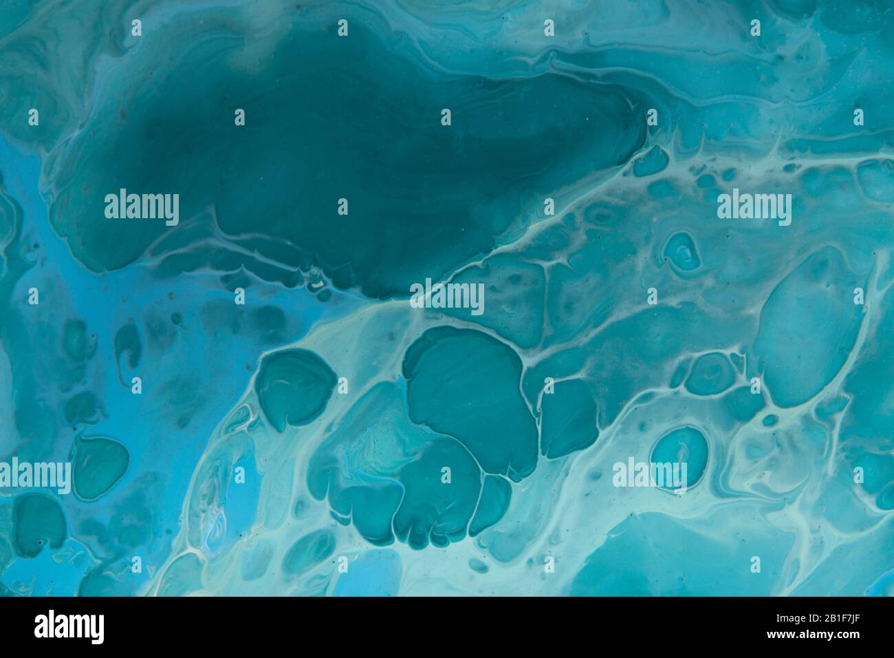 Blue smooth stains with white spots, Vibrant paints for magic art Stock ...