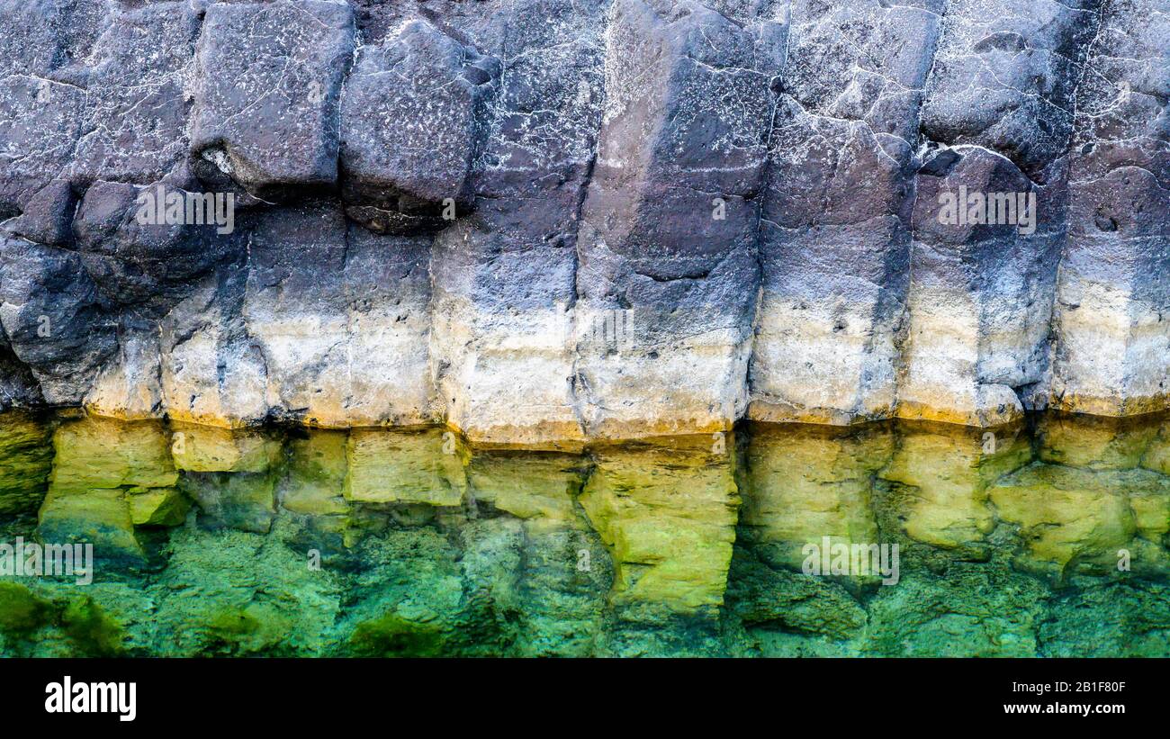 Basalt into columns on steep coast on the atlantic ocean hi-res stock ...