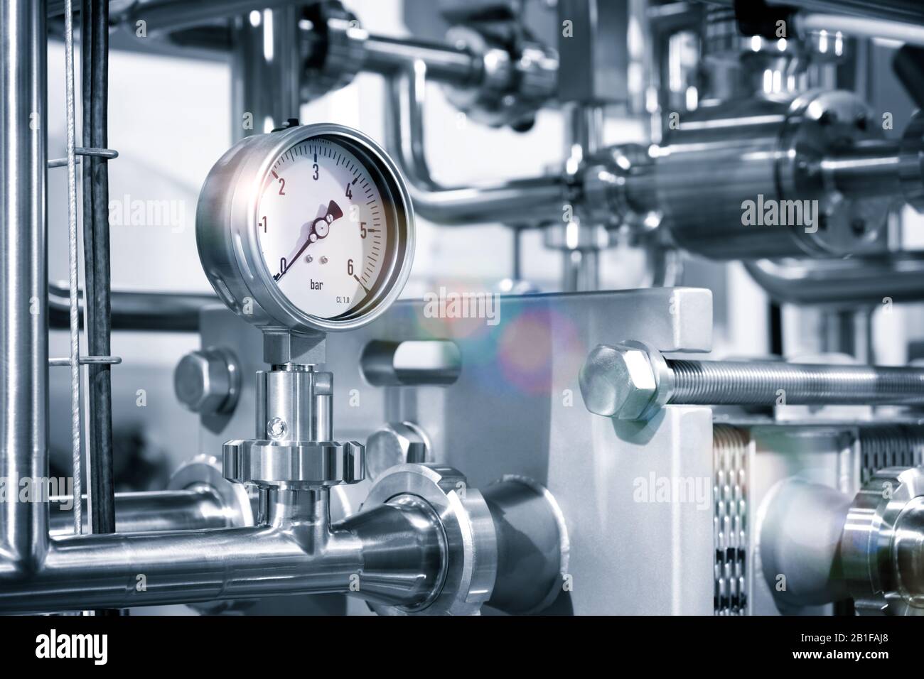 Stainless steel pipes in the factory. Construction on food production ...