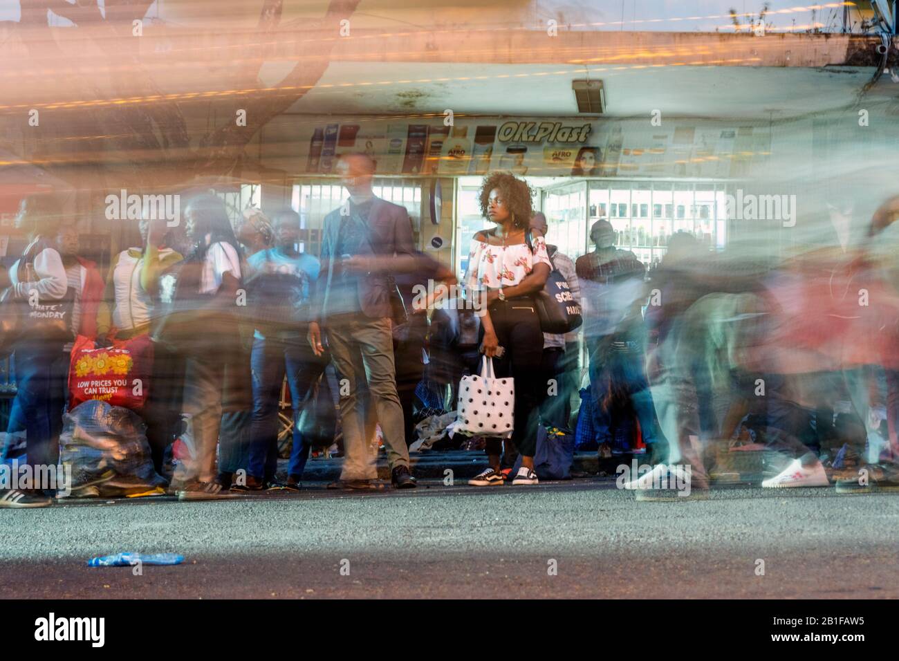 Maputo, Mozambique - May 15, 2019: Many local people waiting for a bus ...