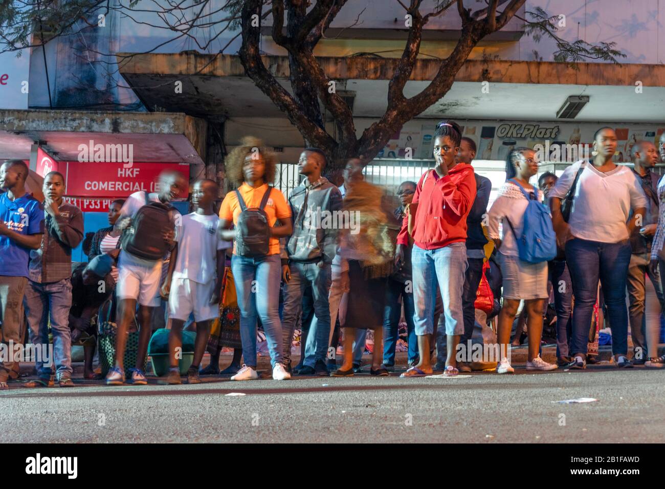Maputo, Mozambique - May 15, 2019: Many local people waiting for a bus ...