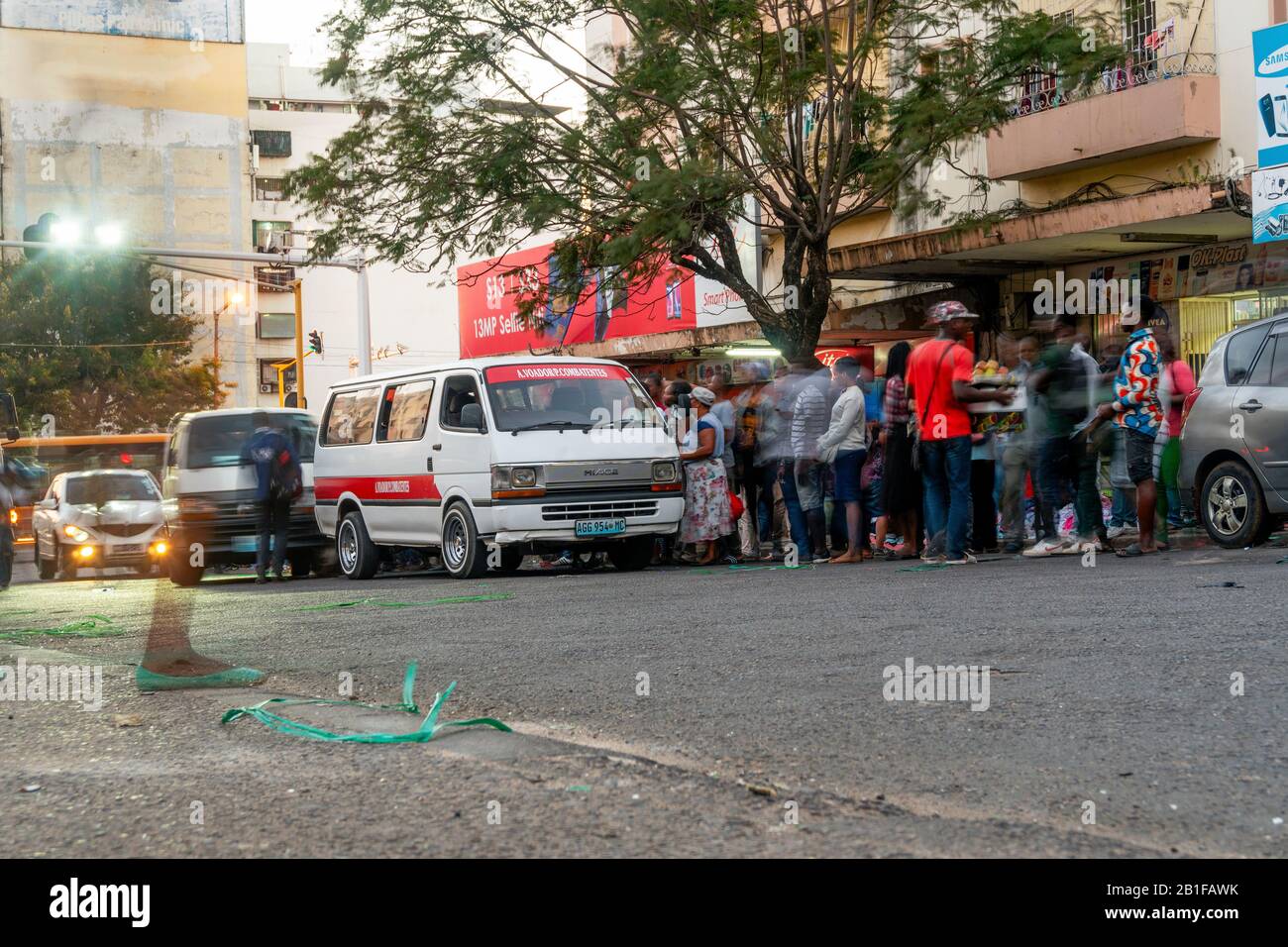 Maputo, Mozambique - May 15, 2019: Many local people entering a bus in ...