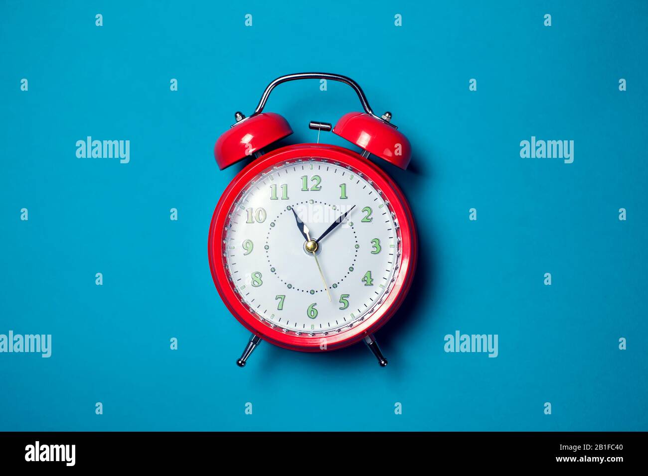 Red clock on background hi-res stock photography and images - Alamy