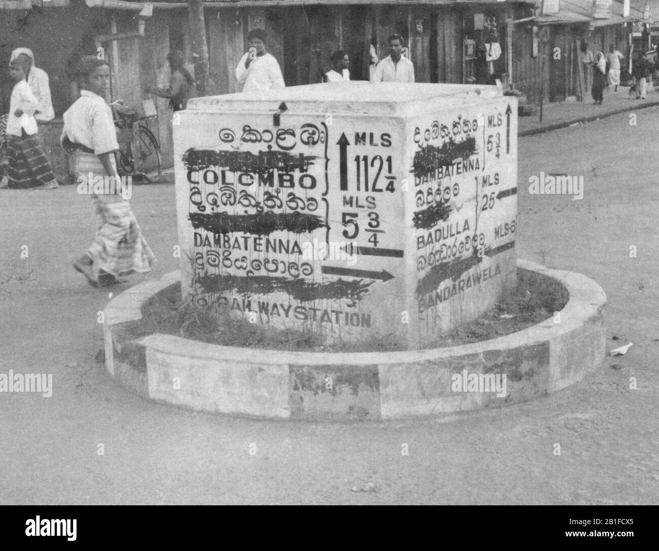 Street sign with some place names crossed out Stock Photo - Alamy