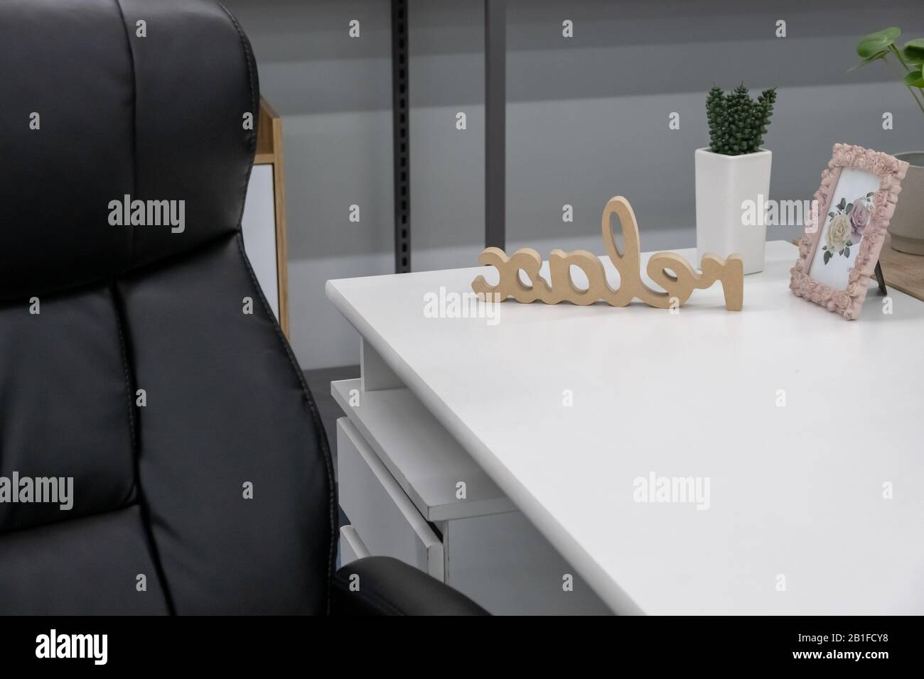 Relax time in office. Empty workplace with word relax. Rest on work ...