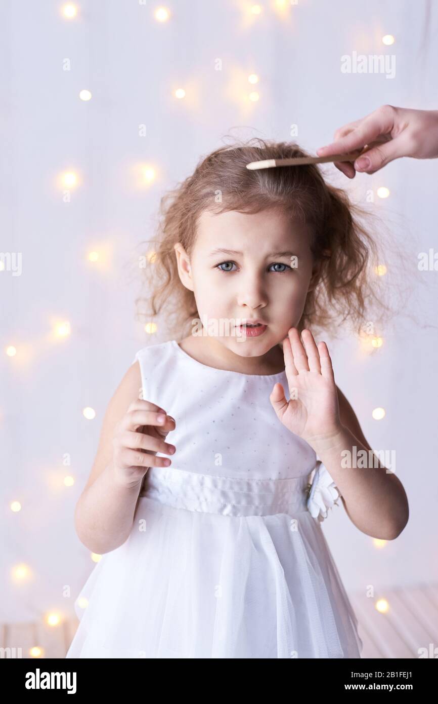 Stop denied gesture. Little cute girl portrait. Hairstylist comb ...