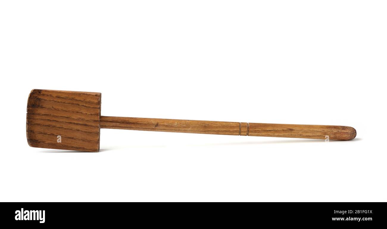 old used wooden kitchen spatula for stirring dishes isolated on white ...
