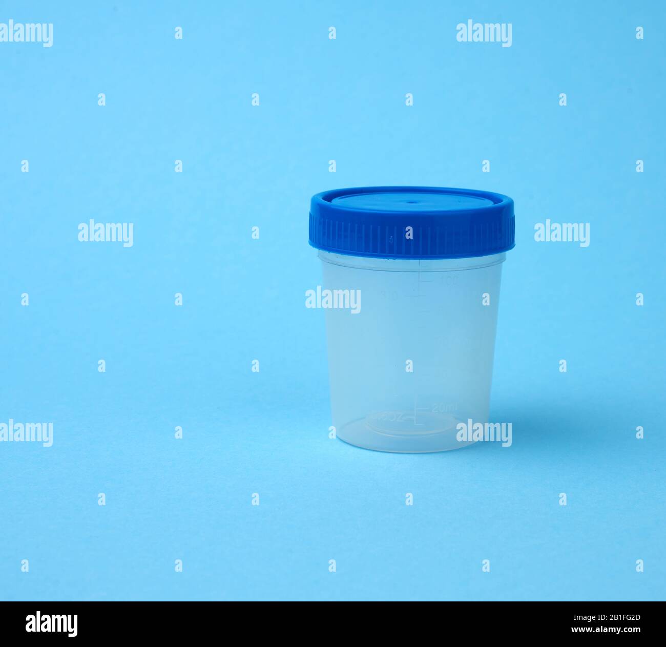 empty plastic jar for medical tests, blue background, urine container ...