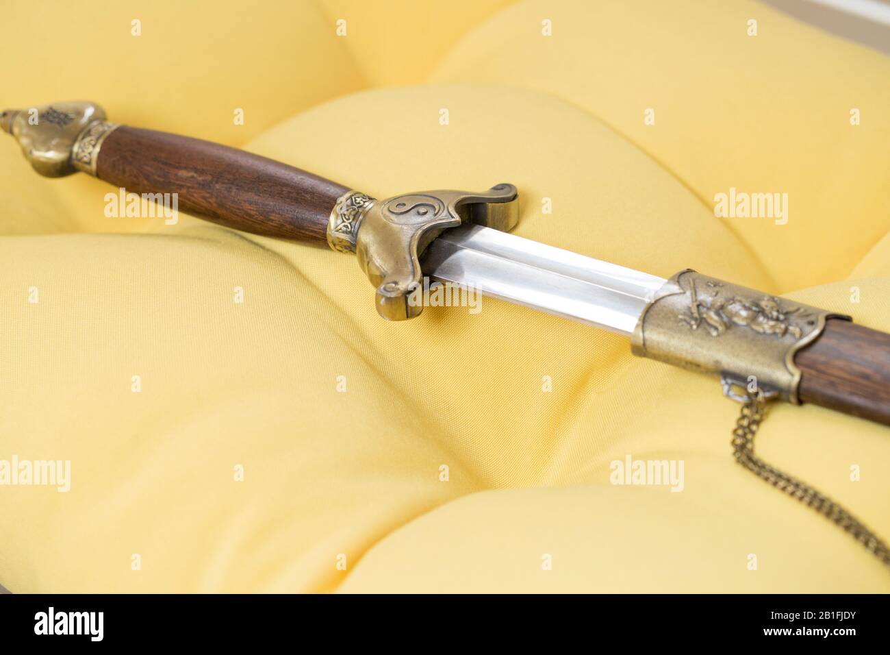 Chinese sword handle wrapped by brown wooden - Image Stock Photo - Alamy
