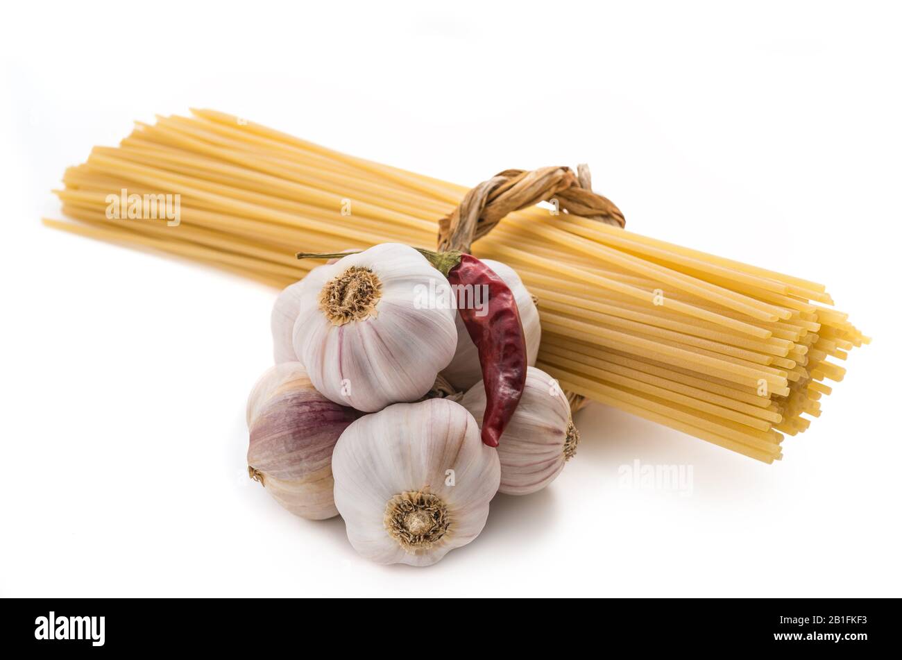 Garlic bulbs red pepper Cut Out Stock Images & Pictures - Alamy