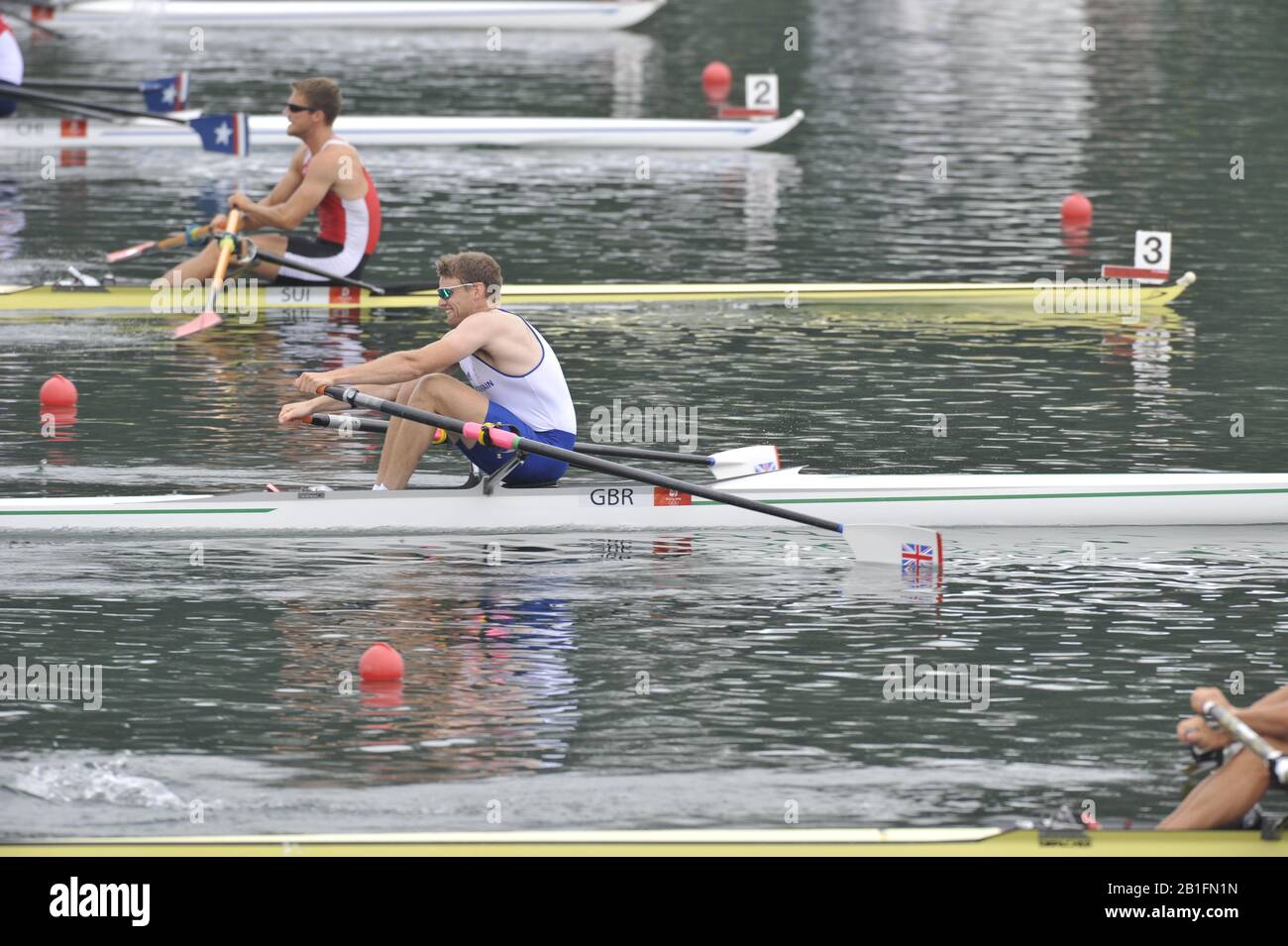 Moves away from the start pontoon 2008 olympic regatta hi-res stock ...