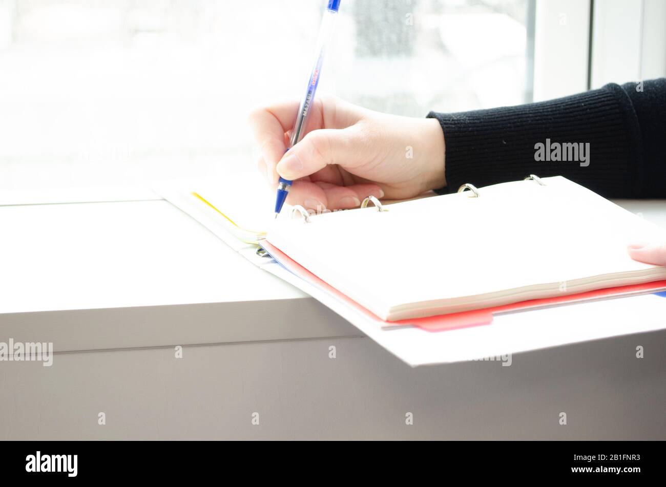 Hand holds document hi-res stock photography and images - Alamy