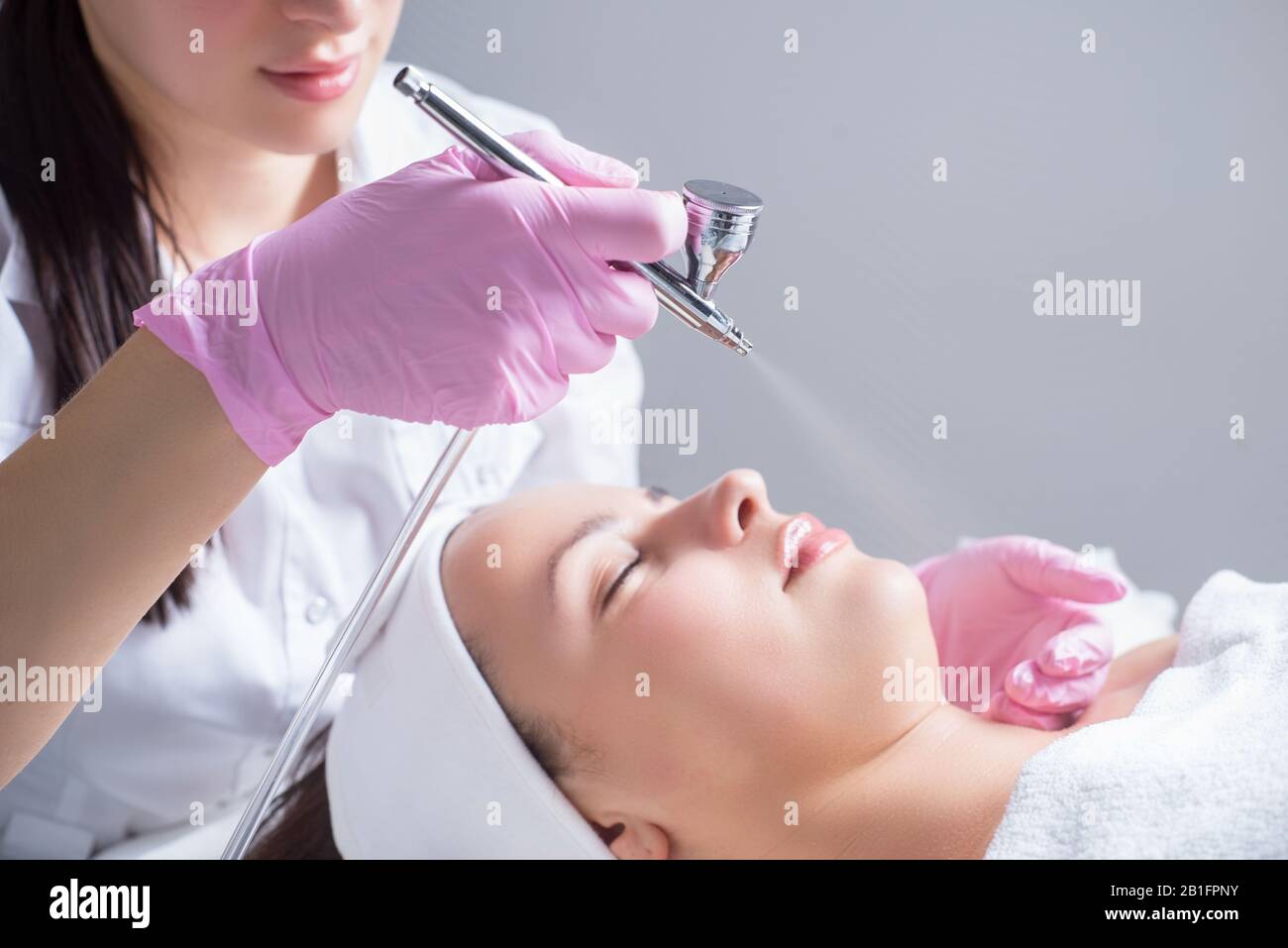 close-up, hands of a professional cosmetologist doctor, using the ...
