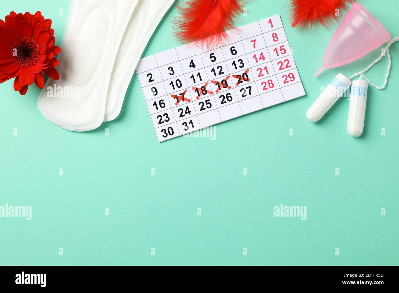 Menstruation period concept on mint background, space for text Stock ...