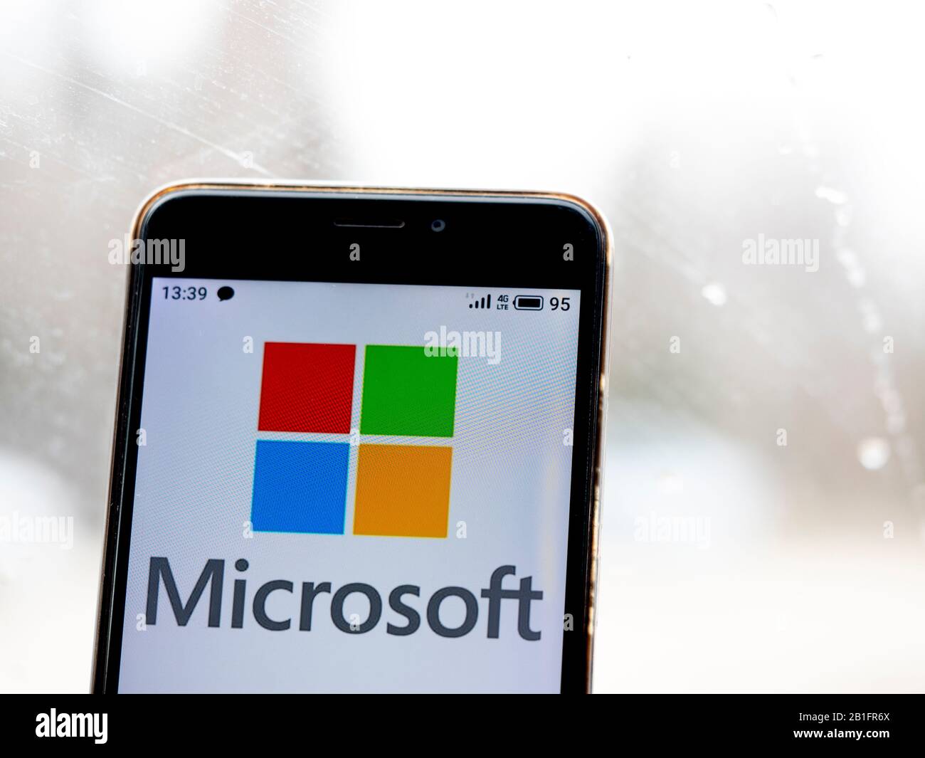 In this photo illustration the Microsoft logo is seen displayed on a ...