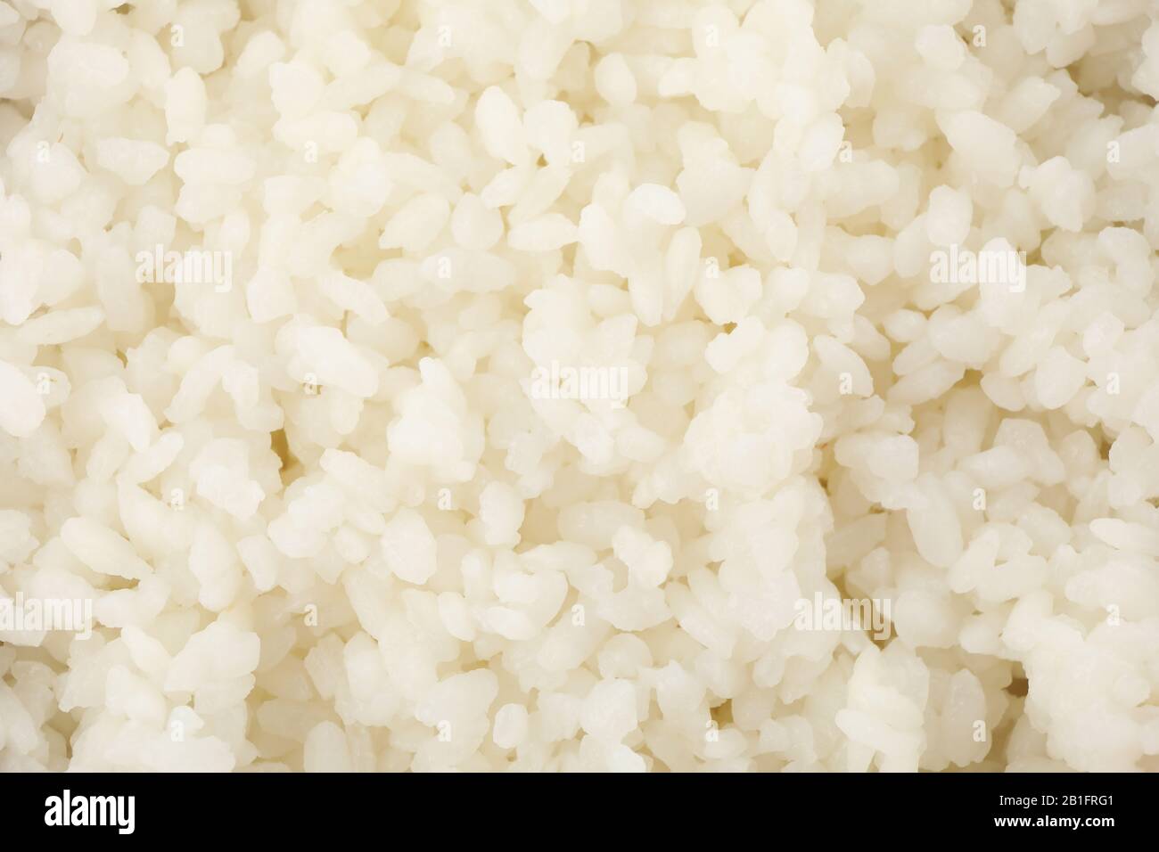 Boiled white rice texture background, close up Stock Photo - Alamy