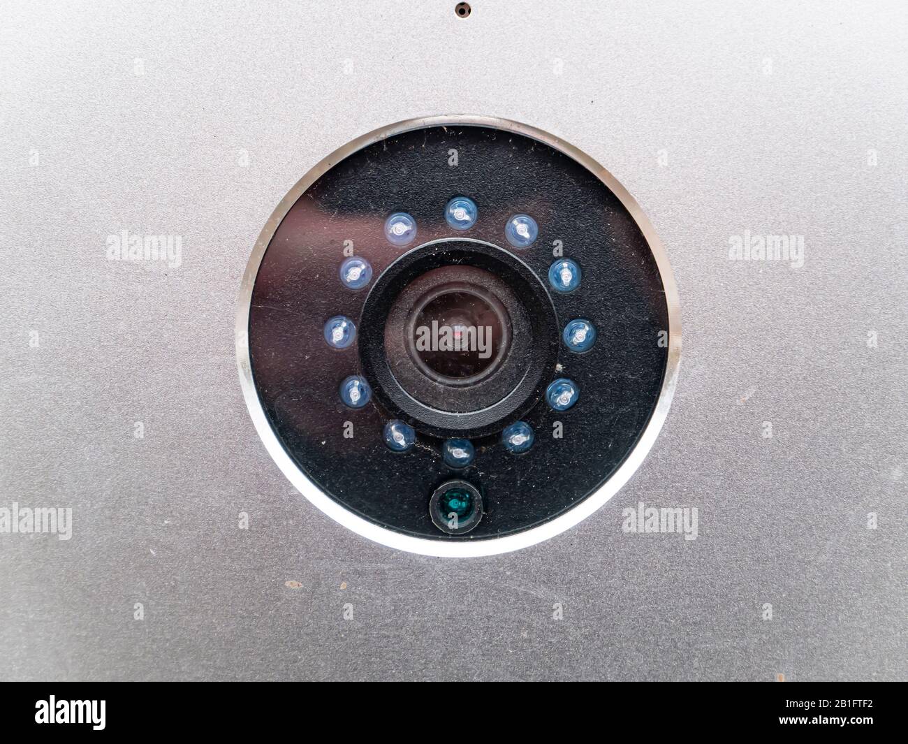The lens of the surveillance camera in a metal case Stock Photo - Alamy