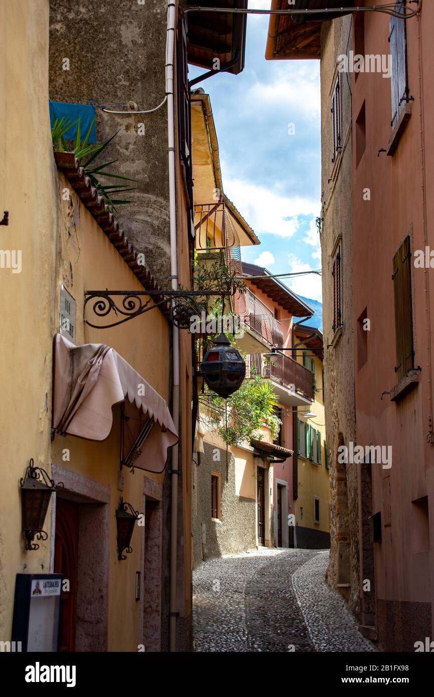 Small italian alleyway in the city Stock Photo - Alamy