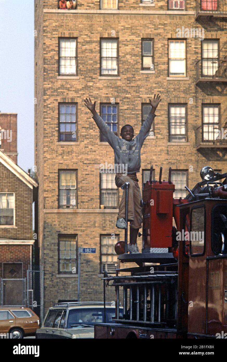 American African boy on New York City fire engine, South Bronx, New ...