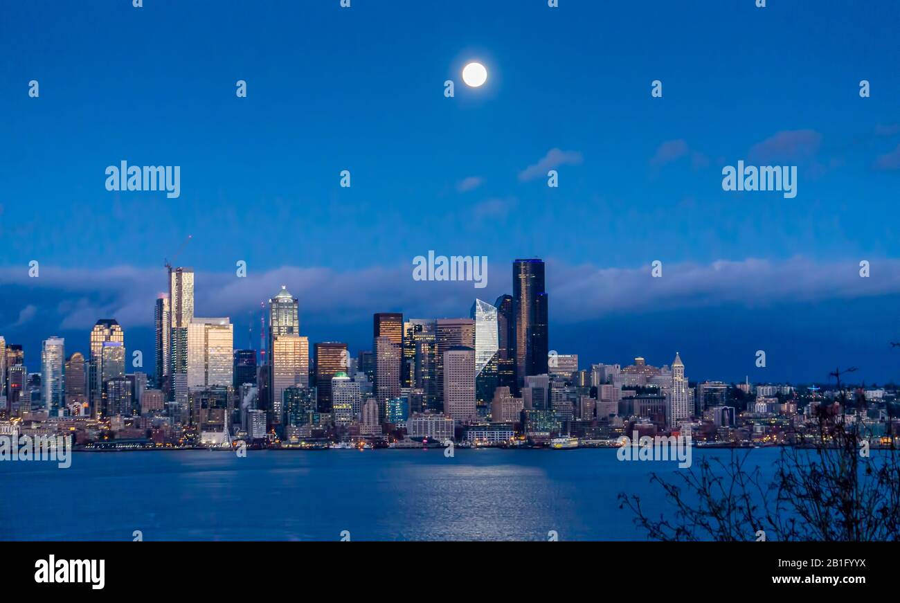 A bright full moon shines over the Seattle skyline Stock Photo - Alamy