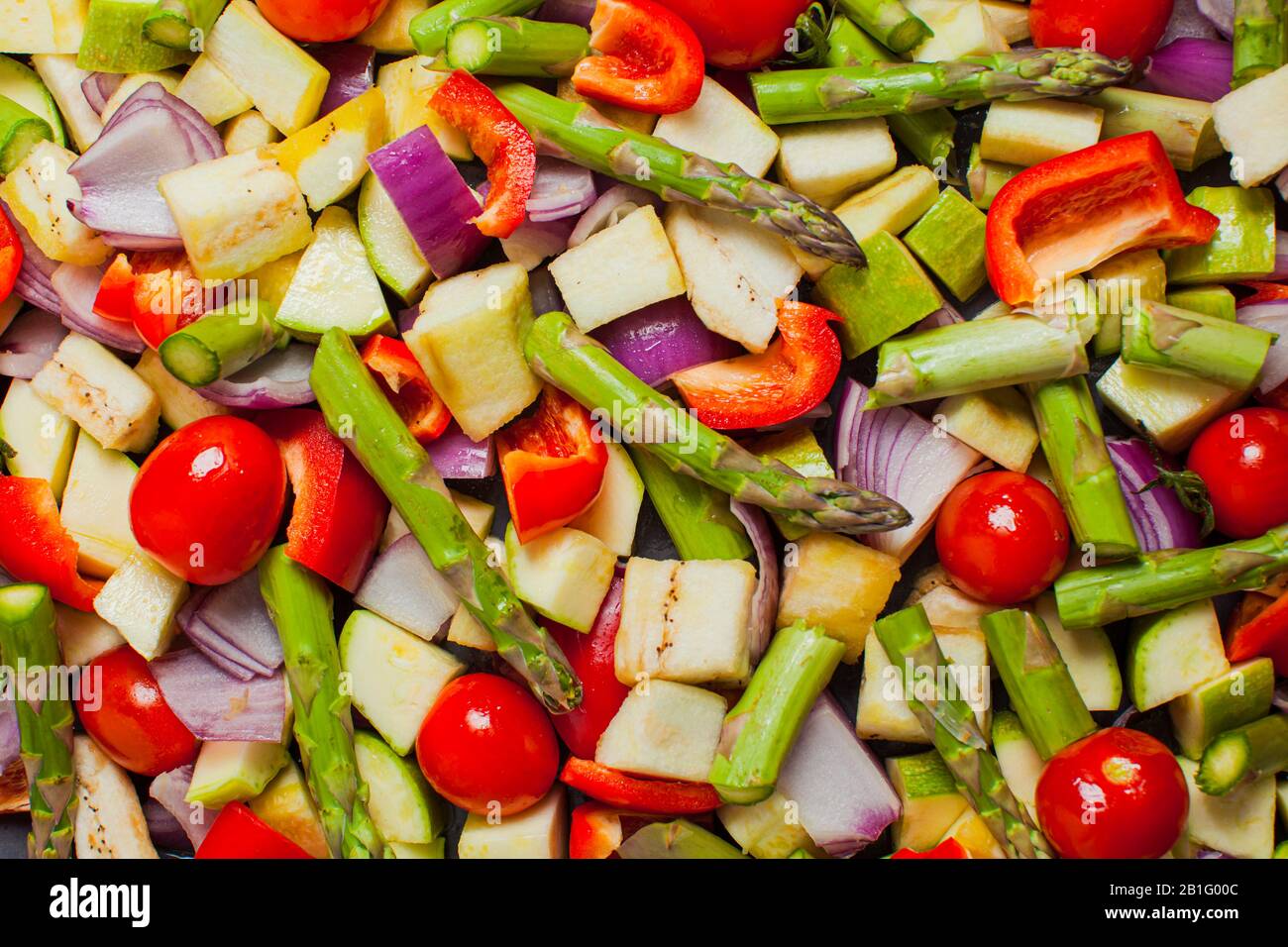 A mix of raw vegetables cut into pieces. Fresh vegetable slices ...