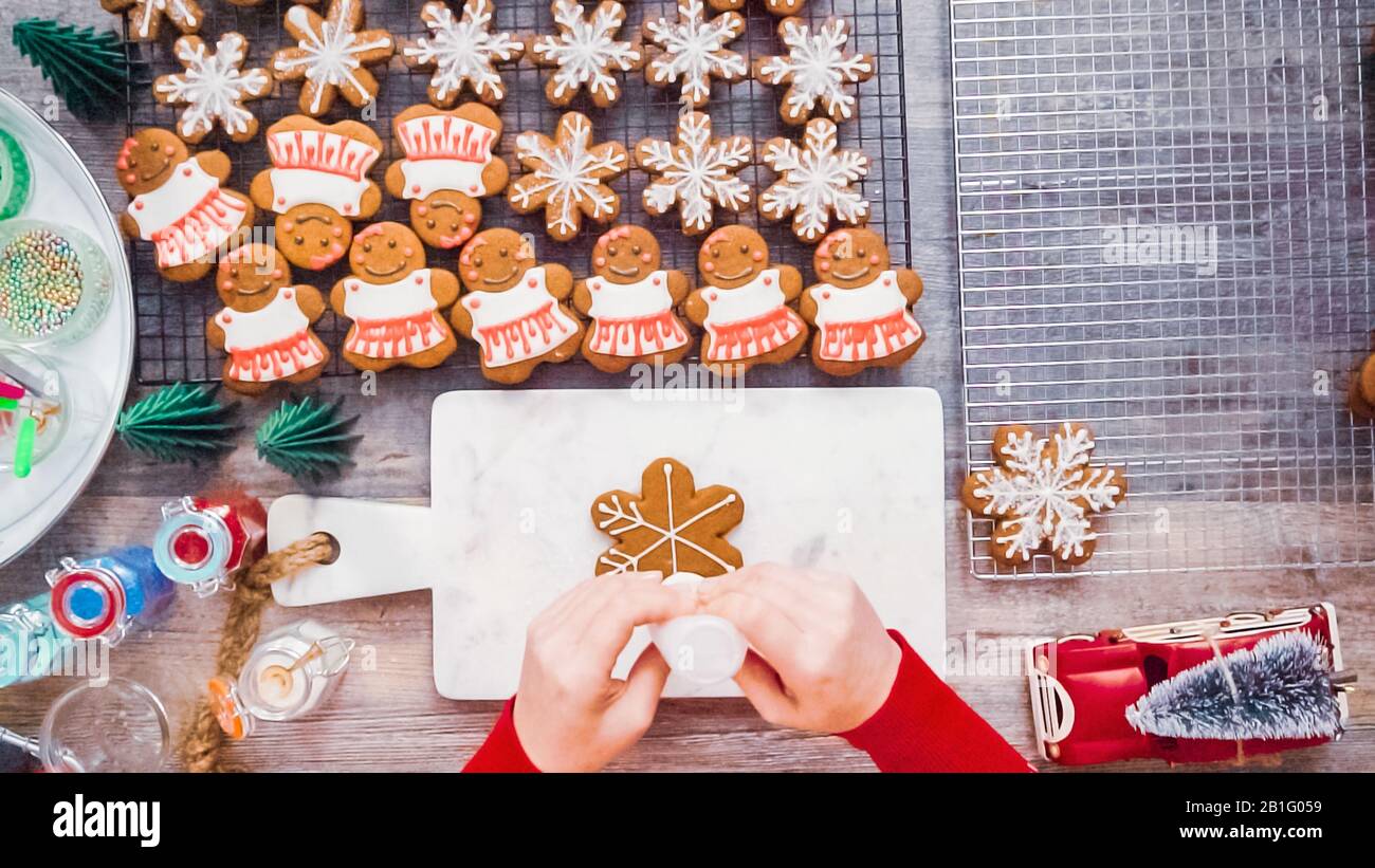 Step by step. Flat lay. Decorating gingerbread cookies with royal icing ...