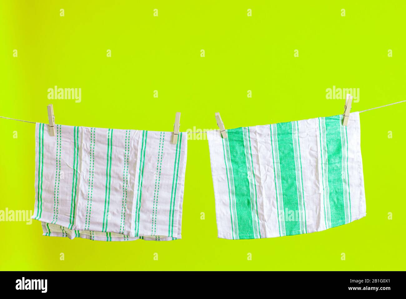 Towels hang on clothesline clothespins hi-res stock photography and ...