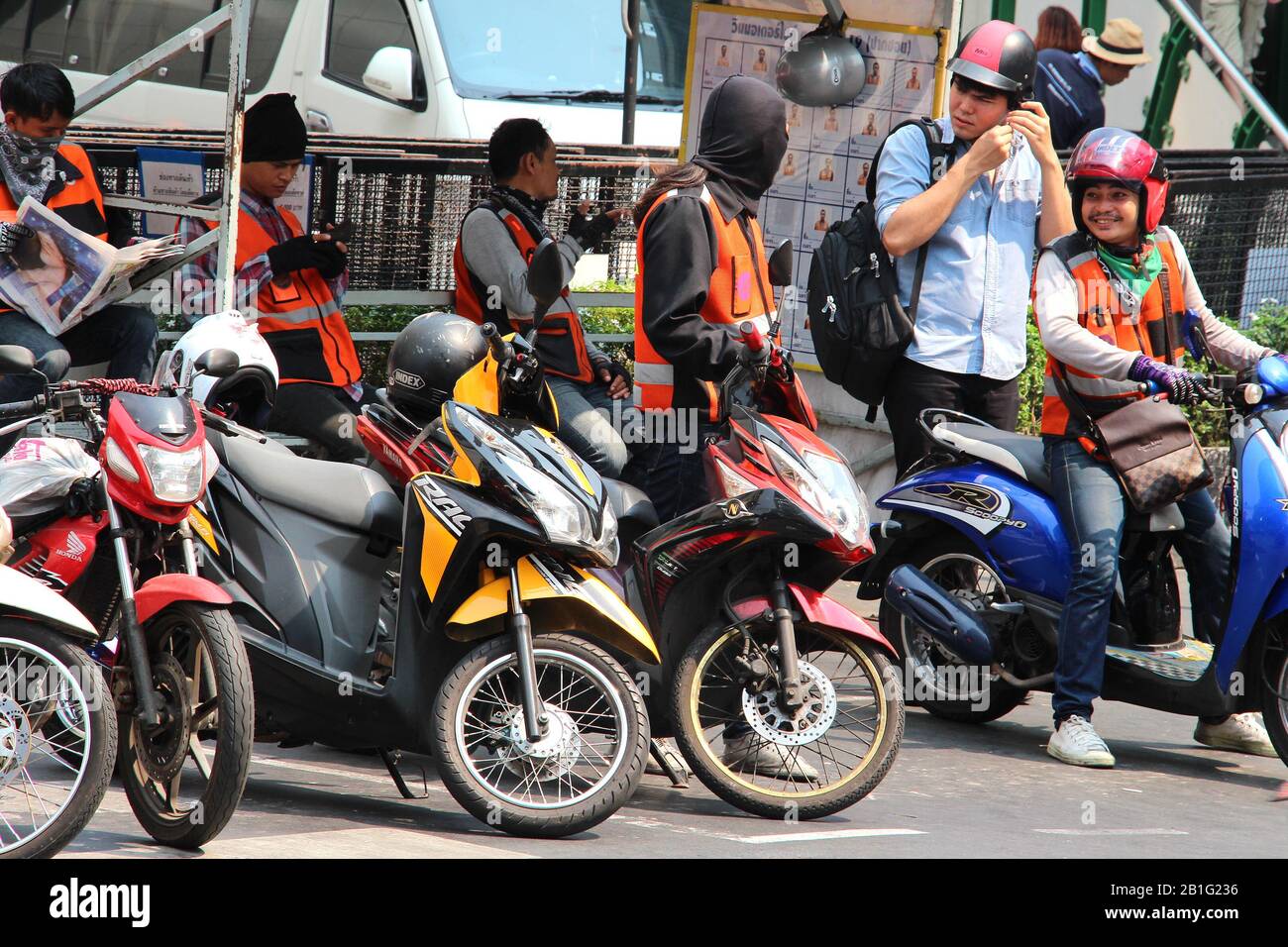 Motorcycle taxis in Bangkok, Thailand Stock Photo - Alamy