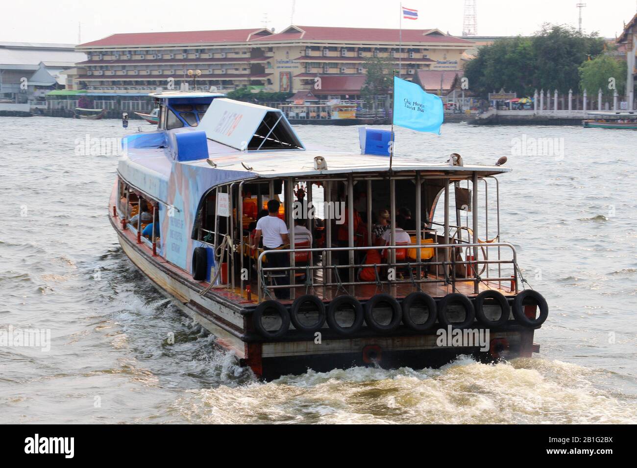 A blue flag tourist boat on the Chao Phraya River, Bangkok Stock Photo ...