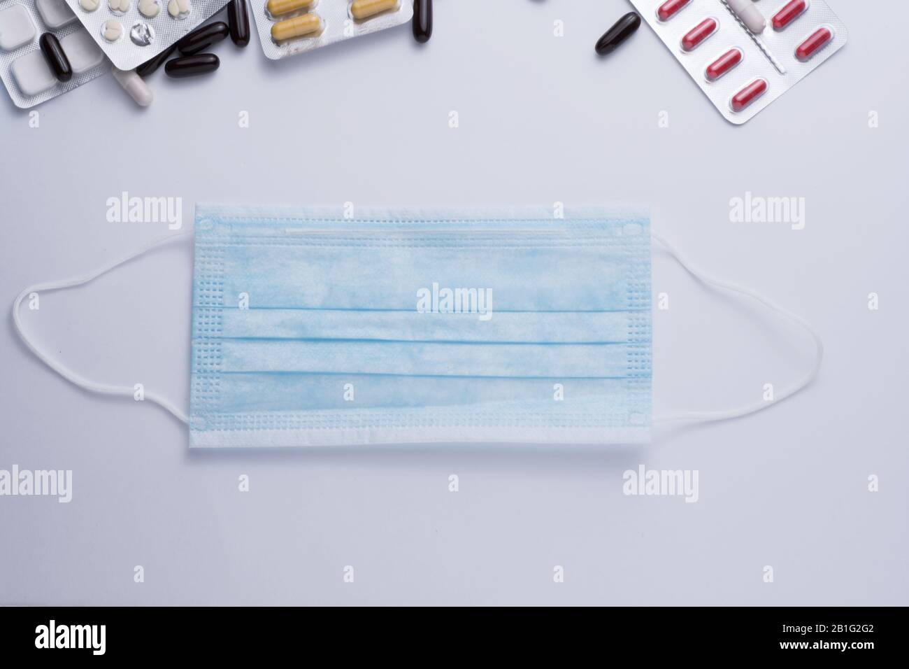 Disposable medical mask, personal protective equipment Stock Photo - Alamy
