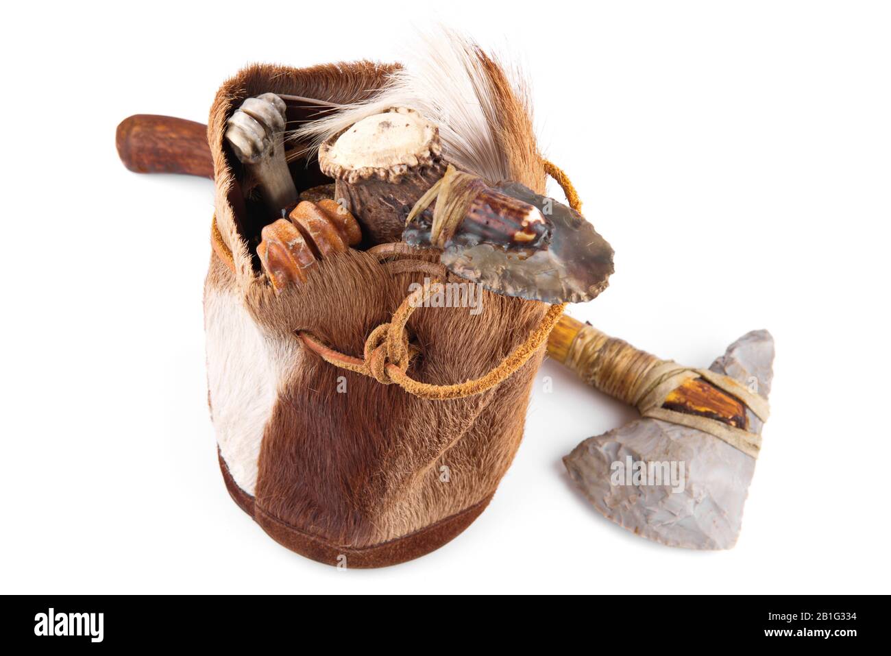Stone Age Handbag with Cavemen Axe and Tools on white Background Stock ...