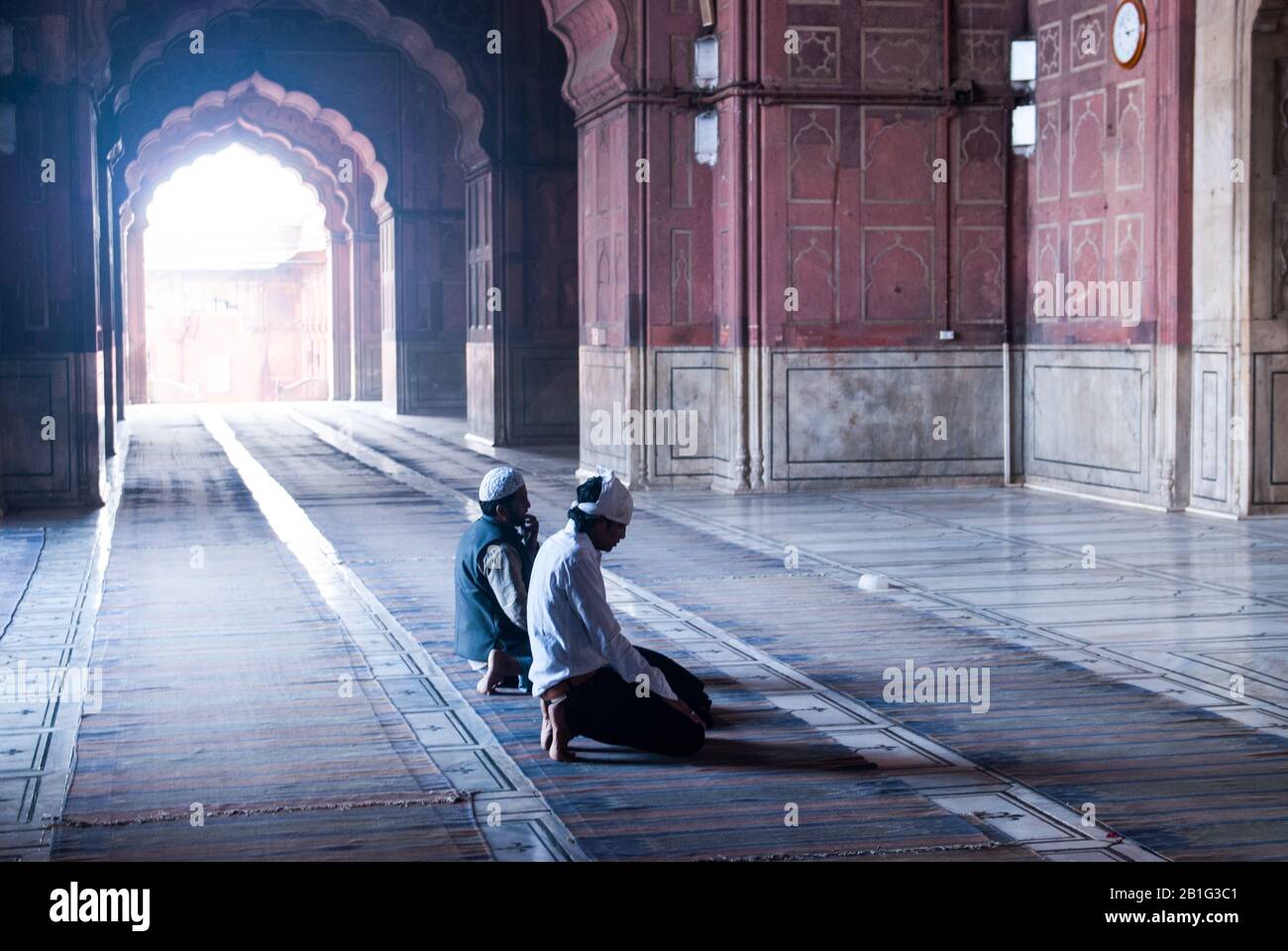 Two Men at Prayers at Jama Masjid, Old Delhi, India Stock Photo - Alamy