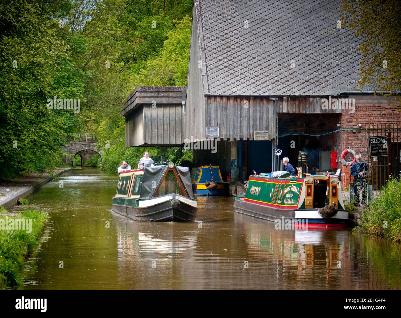 Narrowboats passing Cadbury Wharf on the Shropshire Union Canal near ...