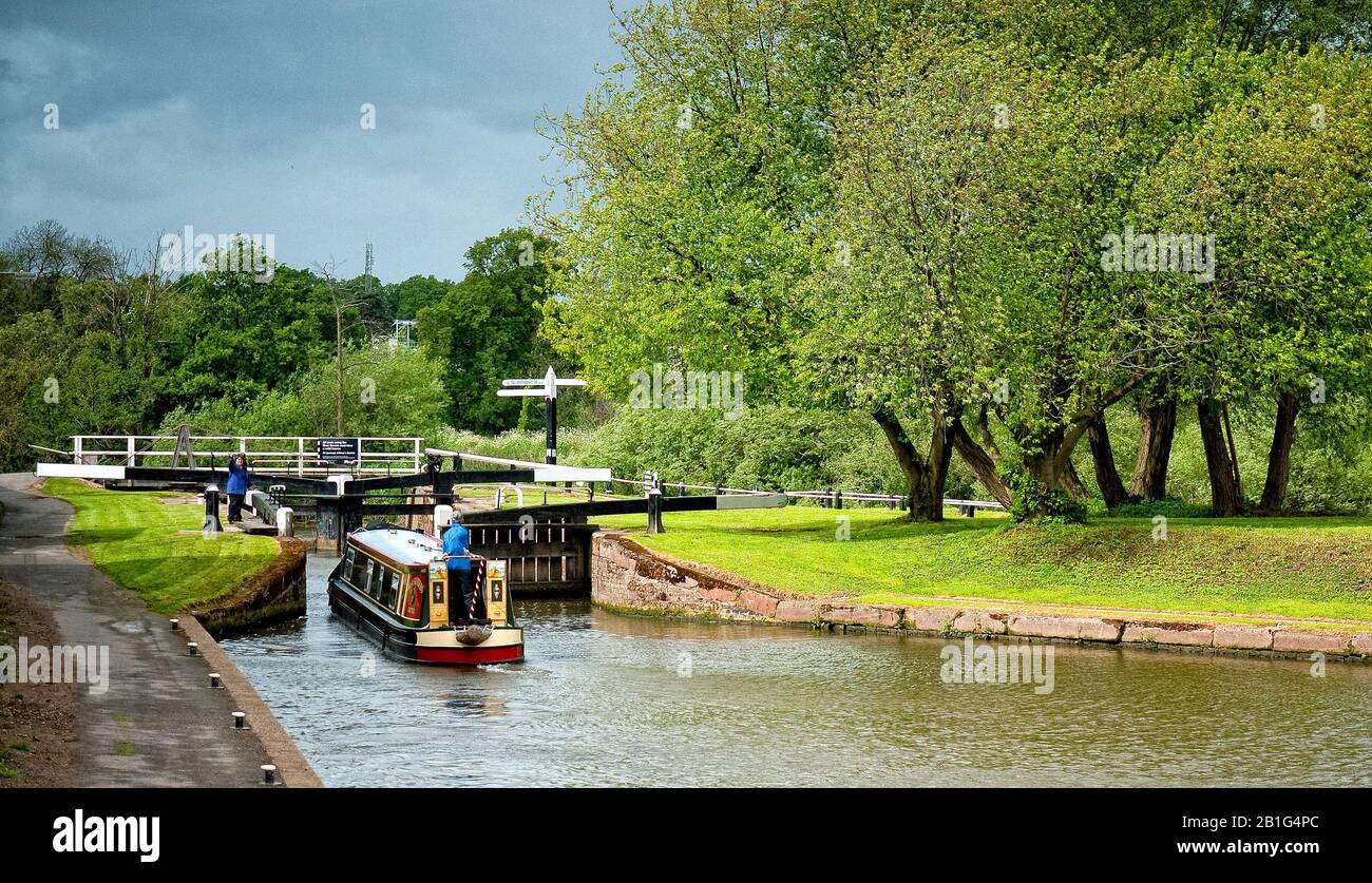 Narrowboat entering Diglis Lock to drop down to the River Severn from the Birmingham and ...