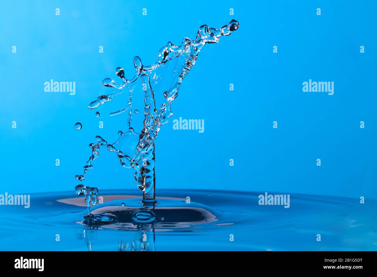 Abstract photograph of a water drop collision created with two water ...