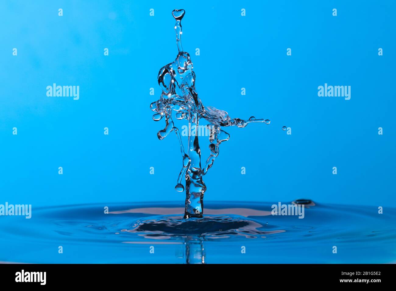 Abstract photograph of a water drop collision created with two water ...