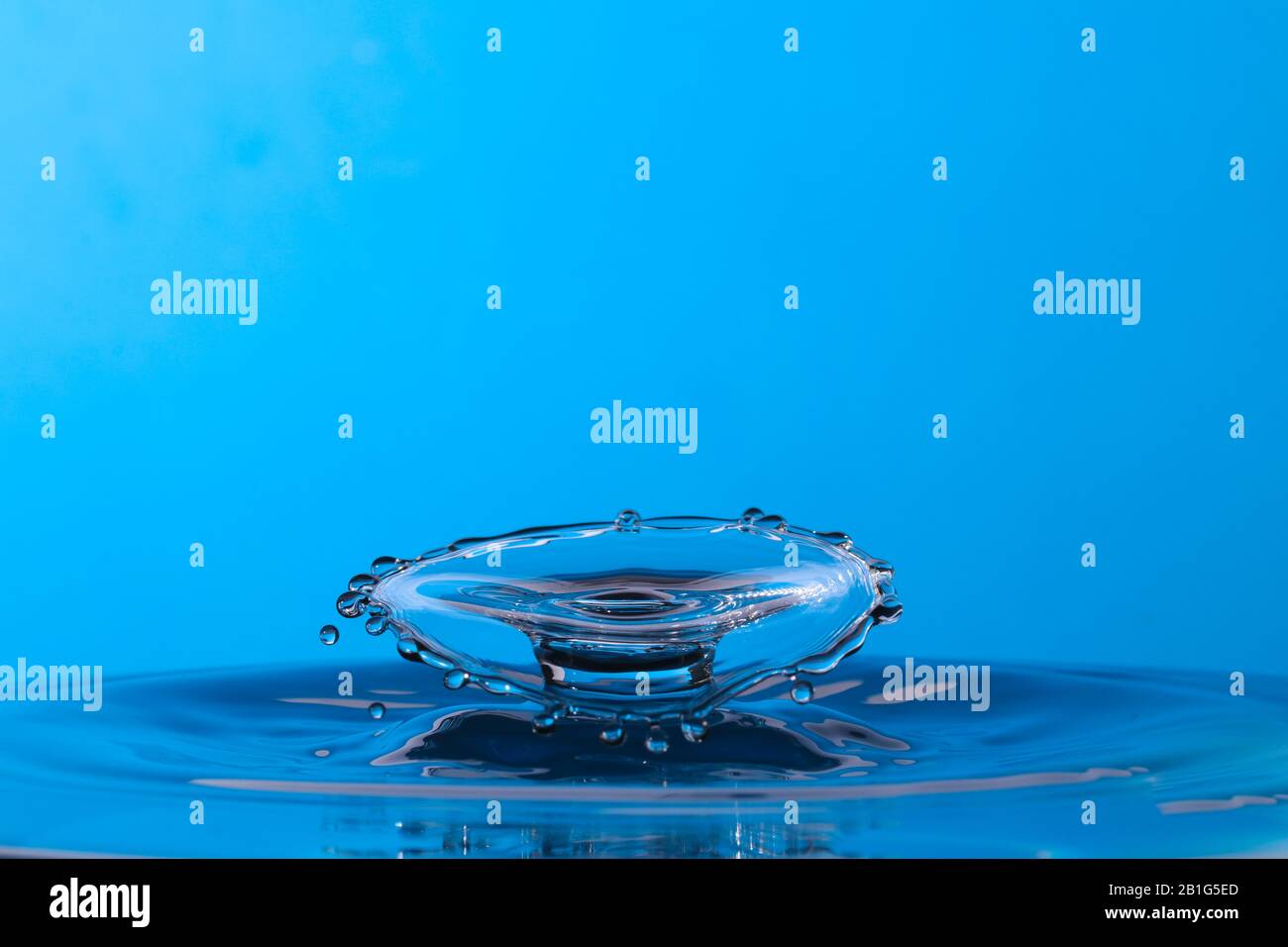 Abstract photograph of a water drop collision created with two water ...